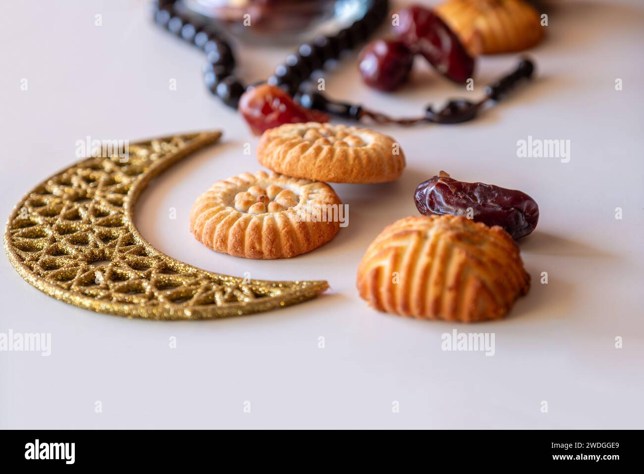 Variety of semolina maamoul cookies displayed with crescent ,star and ...