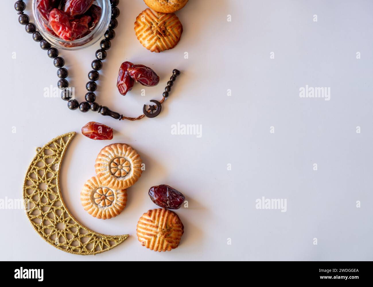 Variety of semolina maamoul cookies displayed with crescent ,star and ...