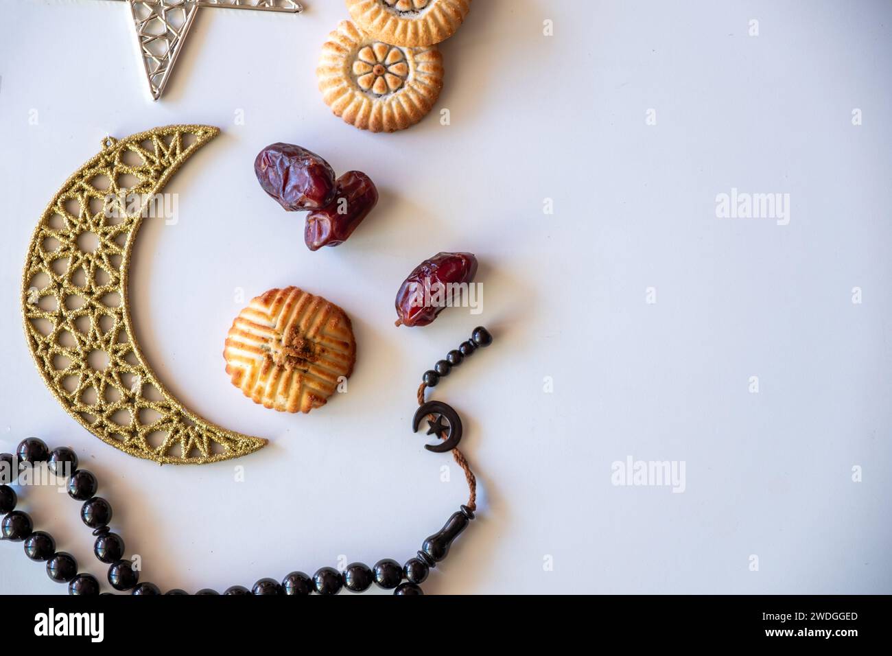 Variety of semolina maamoul cookies displayed with crescent ,star and ...