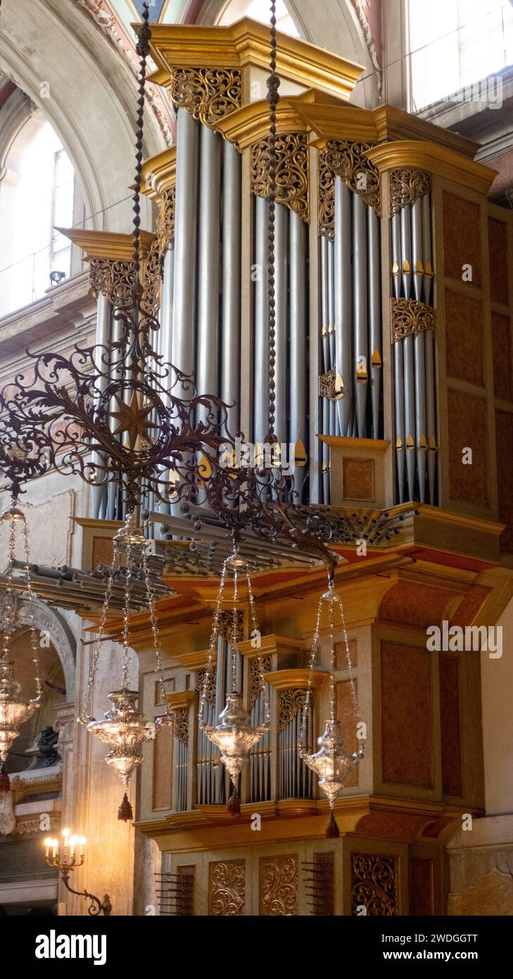 Lisbon Cathedral organ and light fixtures. Lisbon, Portugal Stock Photo ...