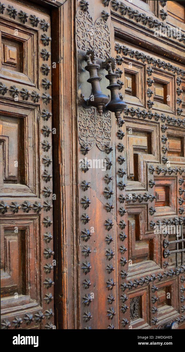 Highly decorative wood door on a street in Madrid, Spain Stock Photo ...