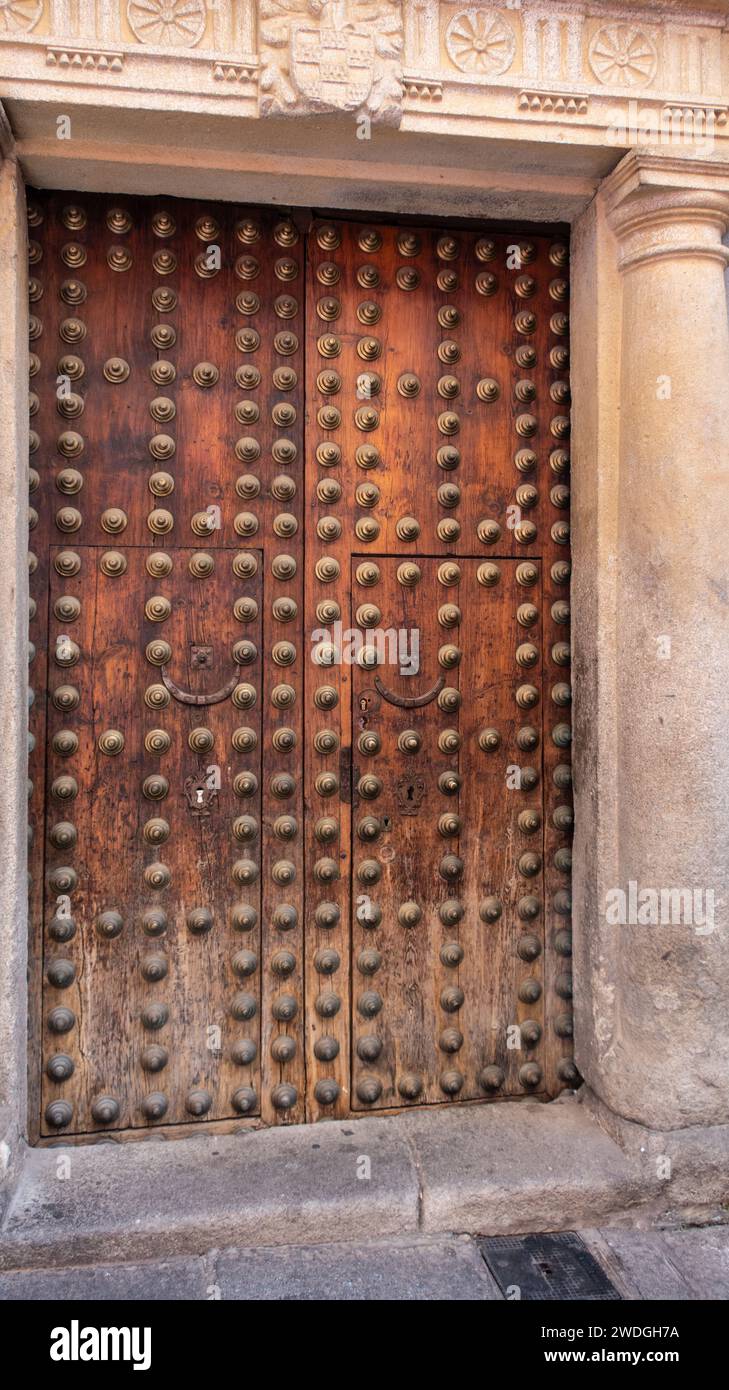 Medieval studded wood door on a street in Madrid Stock Photo - Alamy