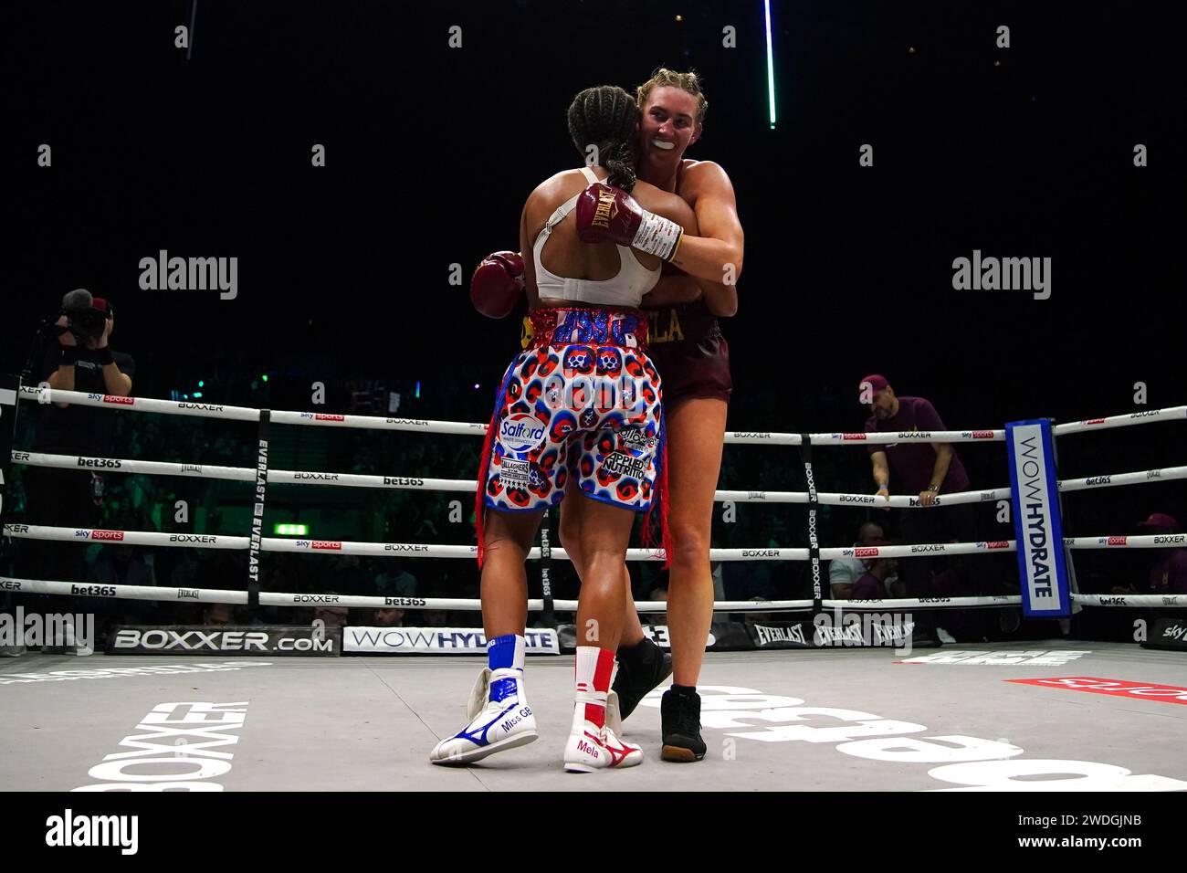 Natasha Jonas (left) and Mikaela Mayer hug after the end of the IBF ...