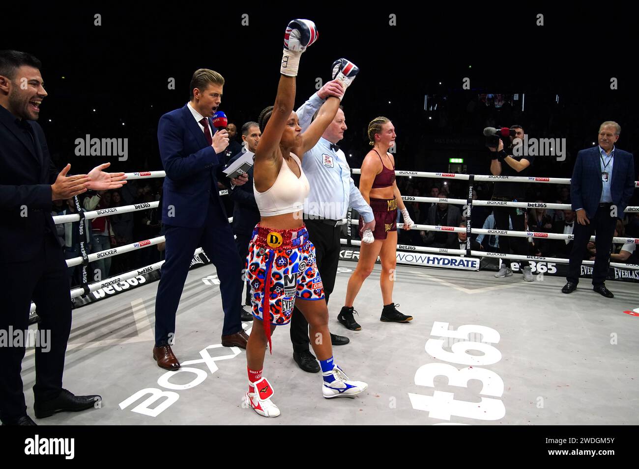 Natasha Jonas (front) celebrates winning the IBF Welterweight Title ...