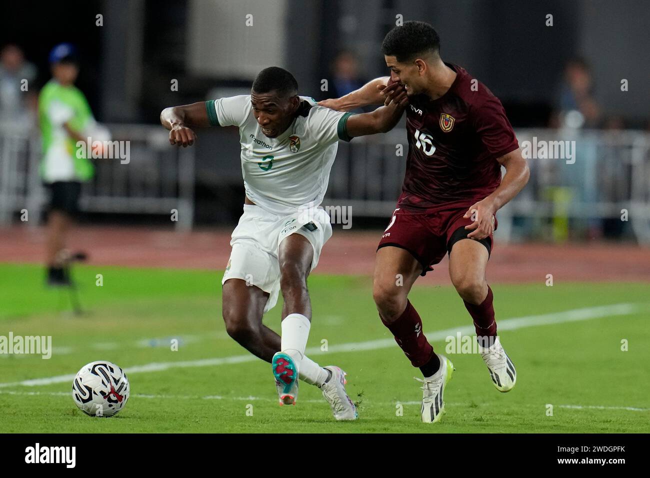 Bolivia's Diego Medina, left, and Venezuela's Renne Rivas, fight for ...