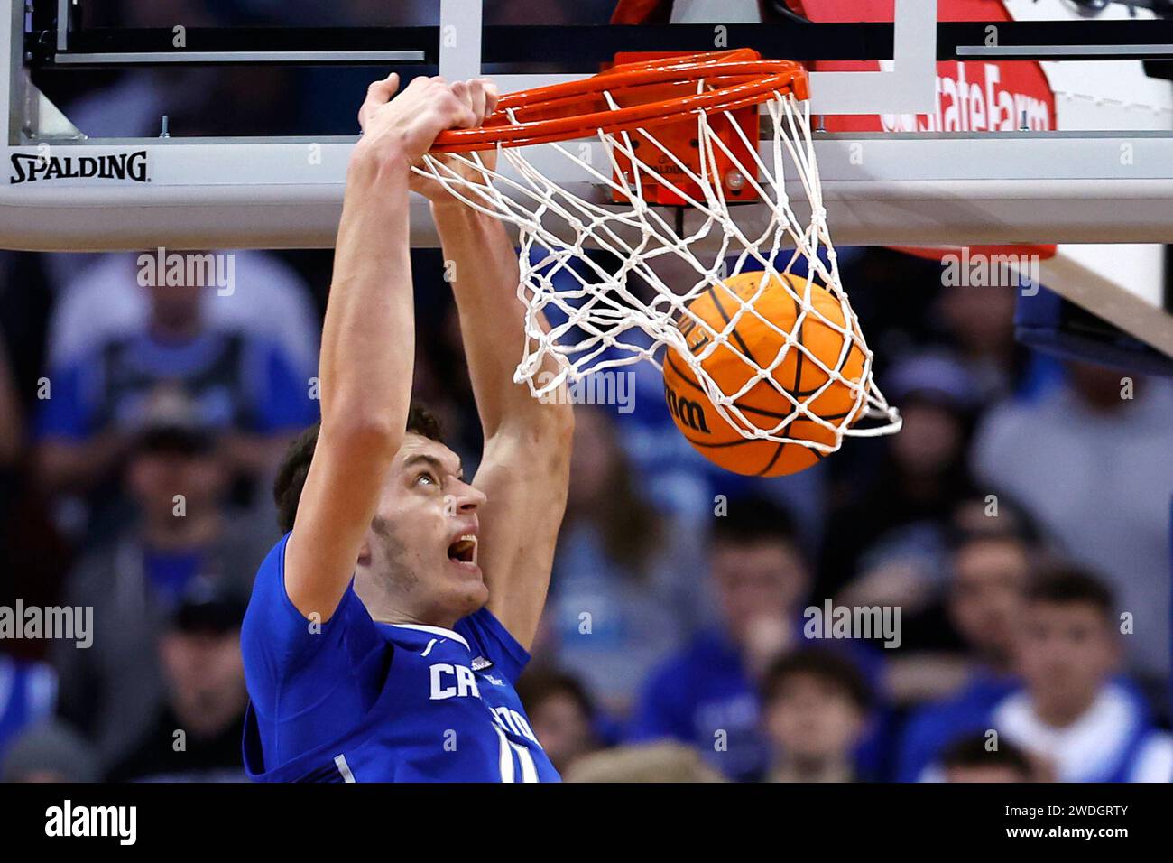 Creighton center Ryan Kalkbrenner (11) dunks during the second half of ...