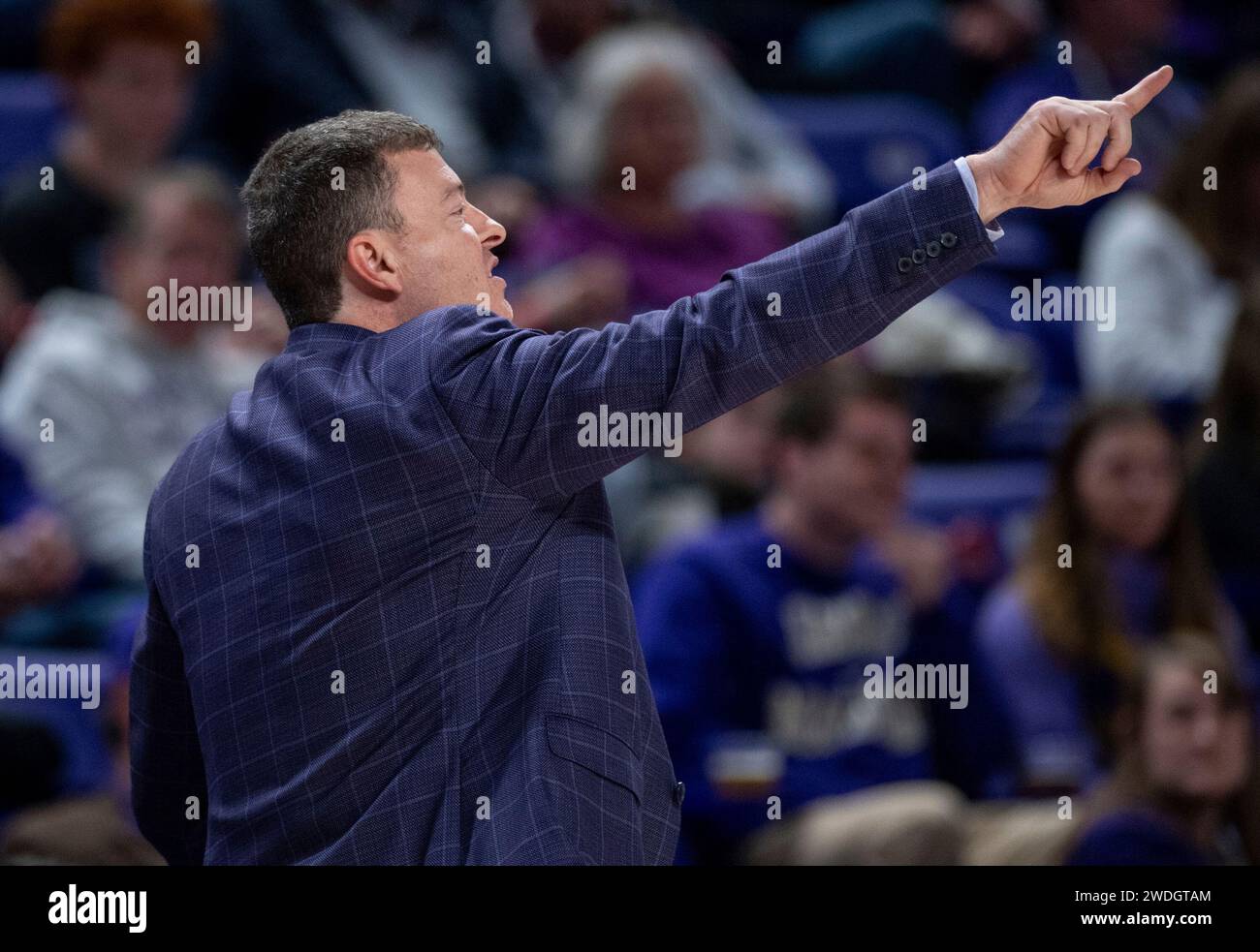 James Madison coach Mark Byington directs the team during the first ...