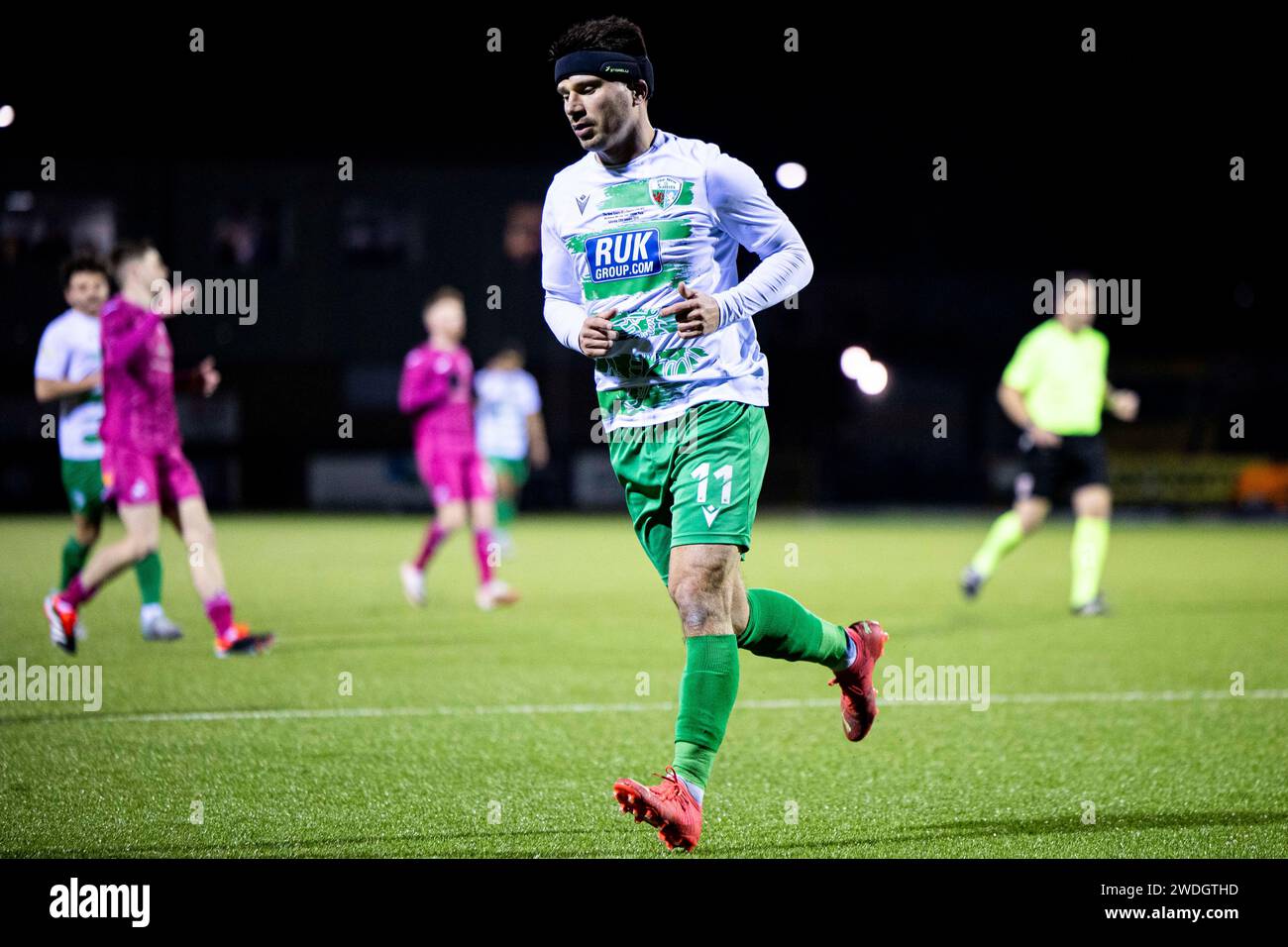 Barry, UK. 20th Jan, 2024. Adrian Cieślewicz of TNS celebrates scoring ...