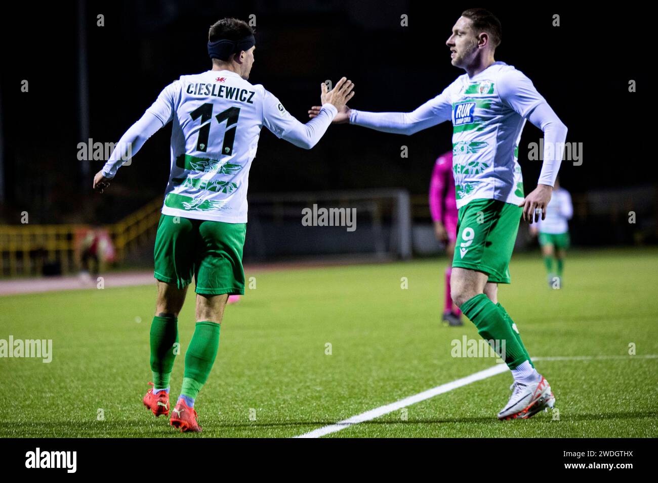 Barry, UK. 20th Jan, 2024. Adrian Cieślewicz of TNS celebrates scoring ...