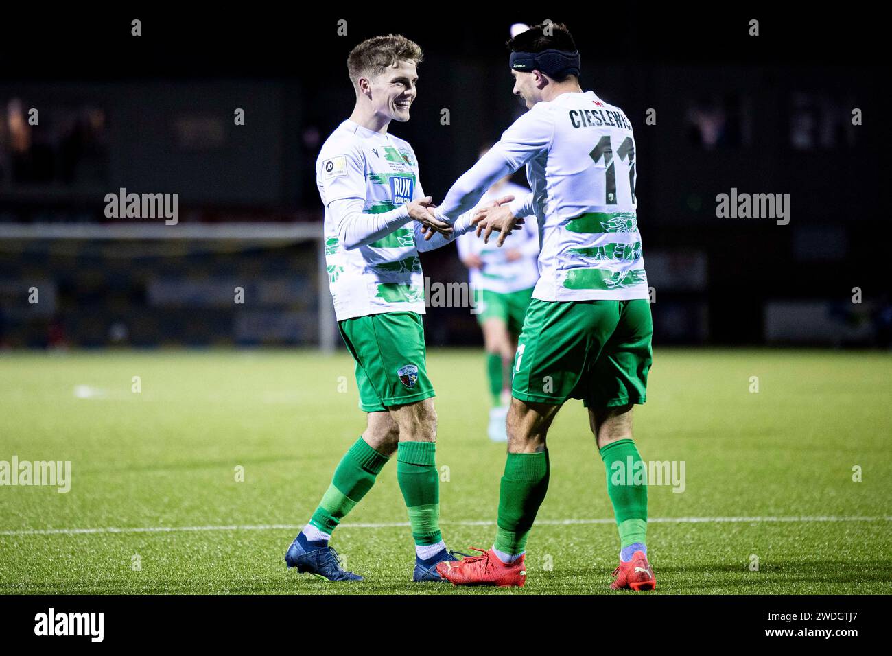 Barry, UK. 20th Jan, 2024. Adrian Cieślewicz of TNS celebrates scoring ...