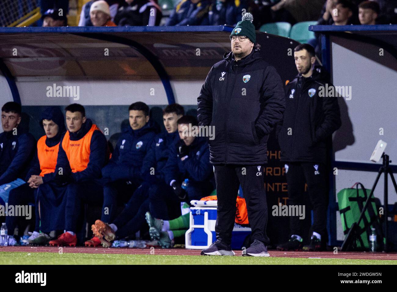 Barry, UK. 20th Jan, 2024. TNS manager Craig Harrison on the touchline ...