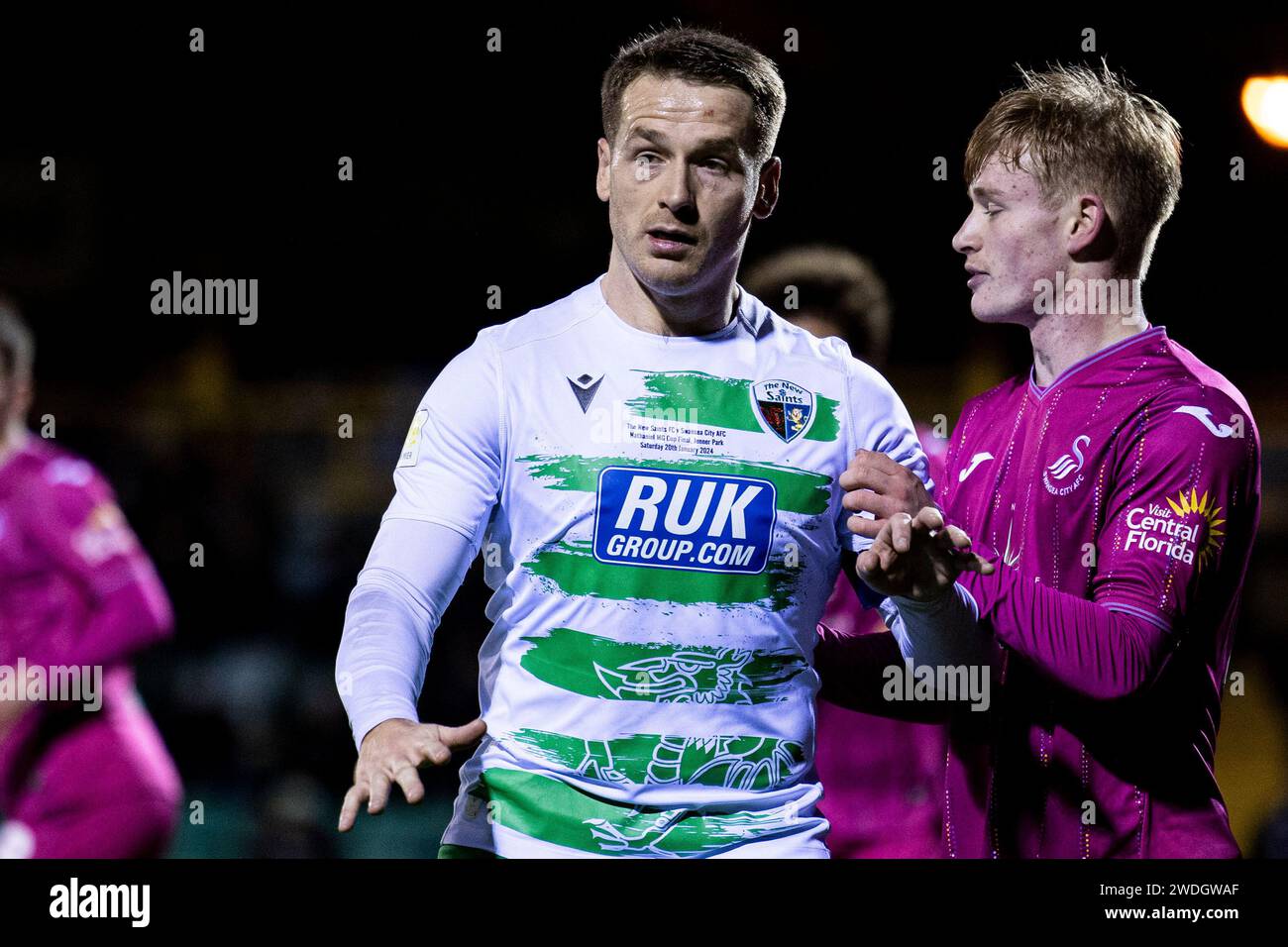 Barry, UK. 20th Jan, 2024. Chris Marriott of TNS in action against Dan ...