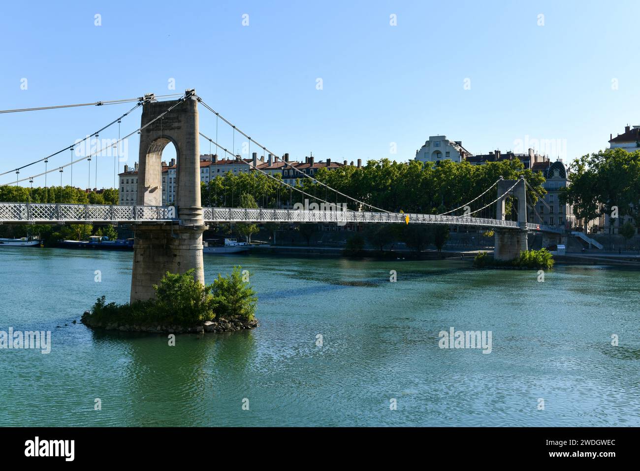 Old Passerelle du College bridge over Rhone river on a Summer day in ...