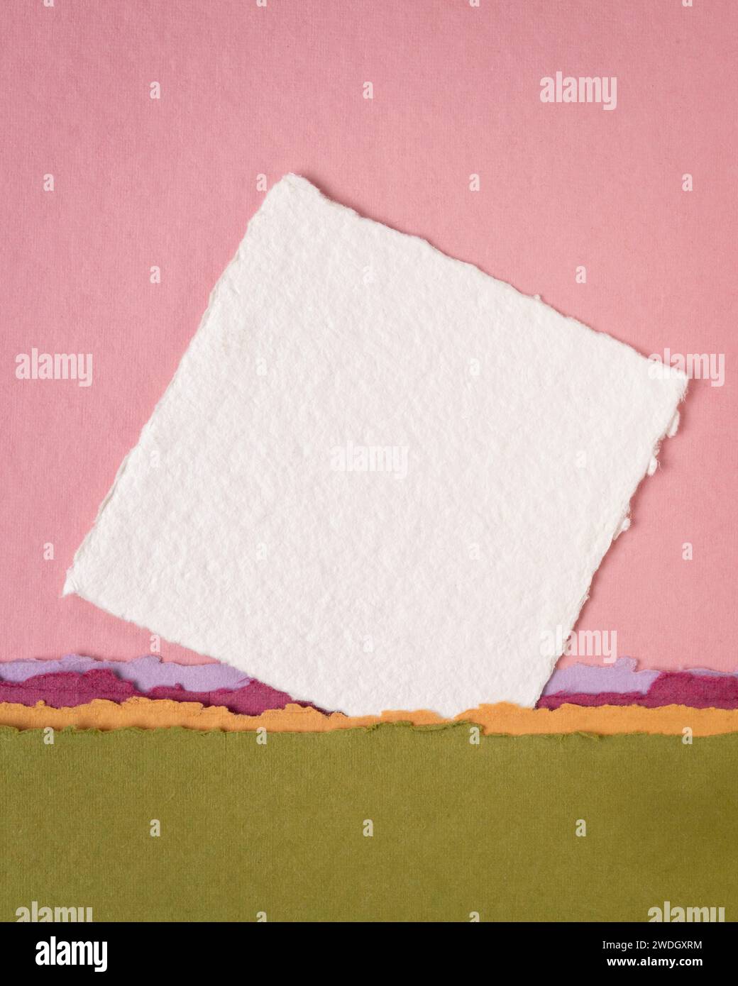 small sheet of blank white Khadi rag paper from India against abstract ...