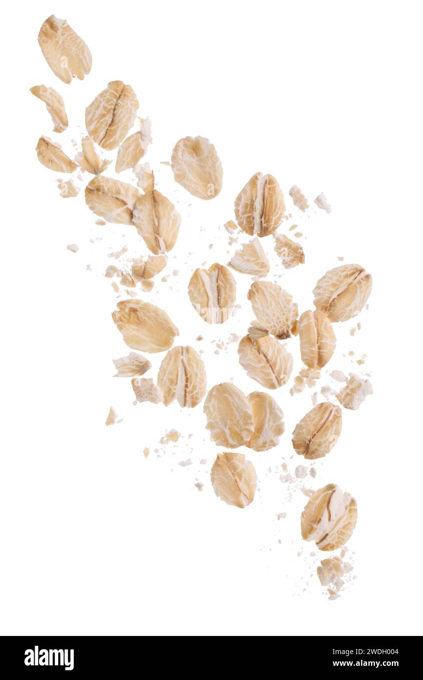Dry oat flakes falling on white background Stock Photo - Alamy
