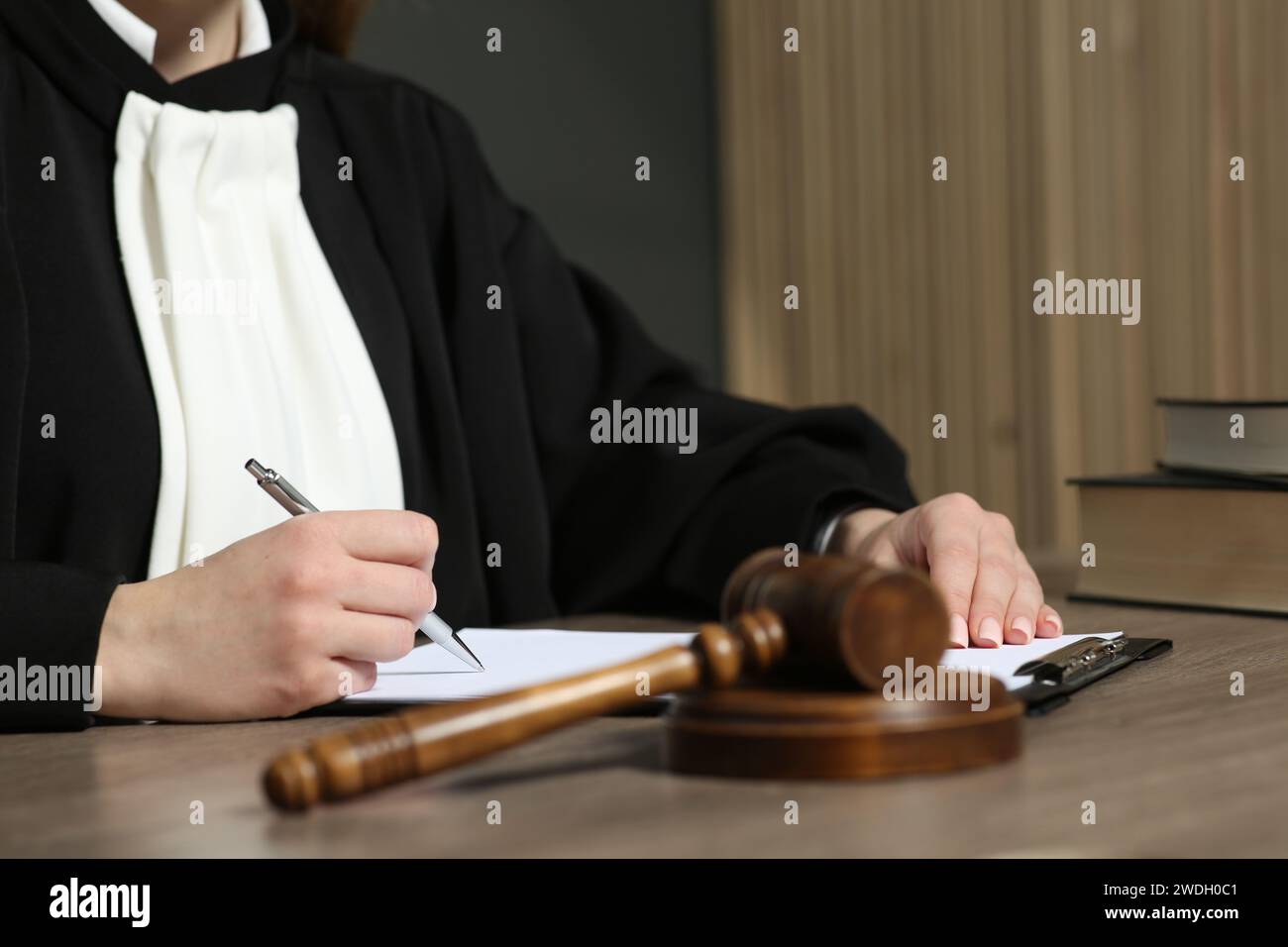 Female judge working in courtroom hi-res stock photography and images ...