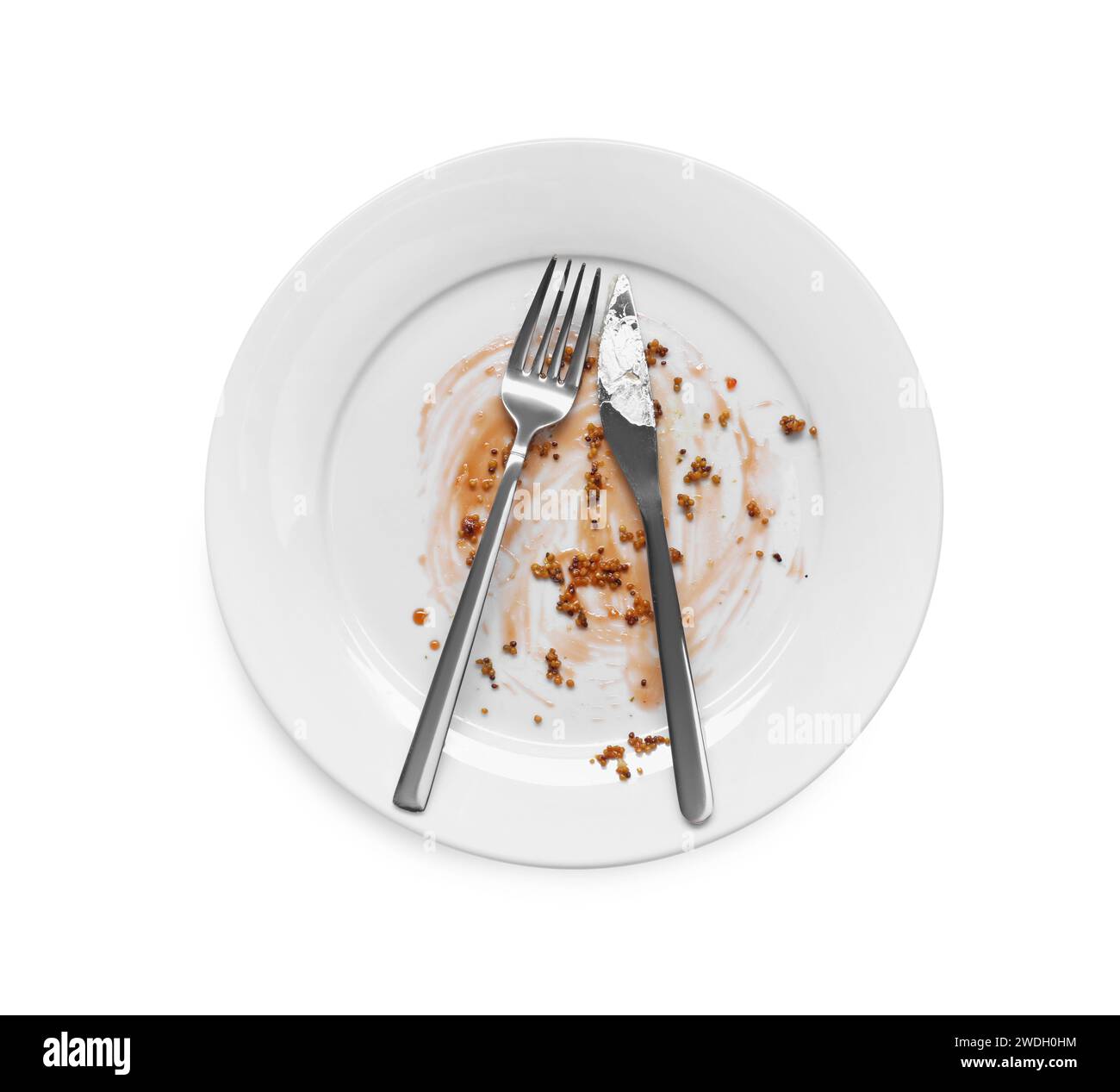 Dirty plate and cutlery on white background, top view Stock Photo - Alamy