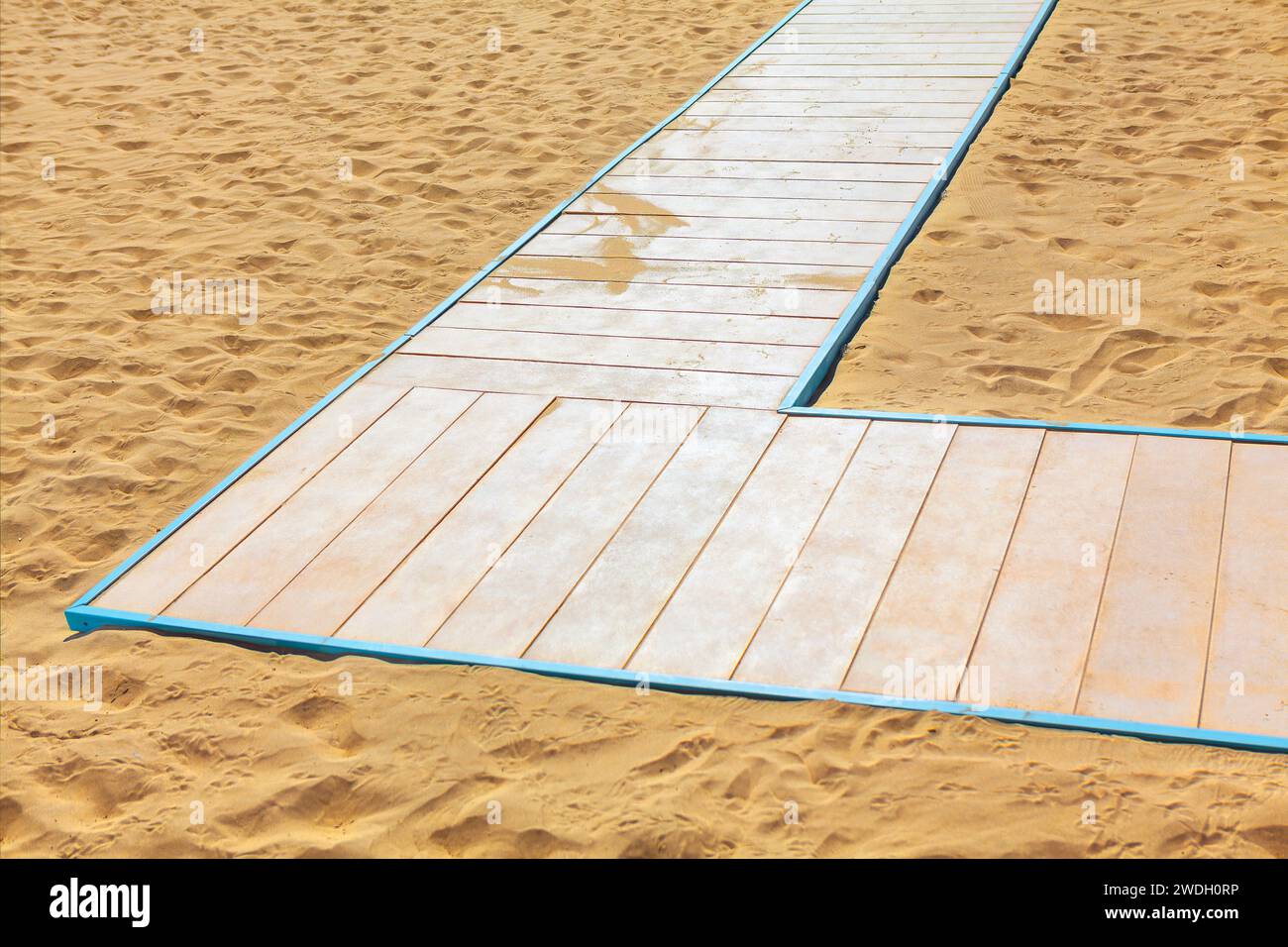 Wooden walkway on the sand beach in the summer time Stock Photo - Alamy