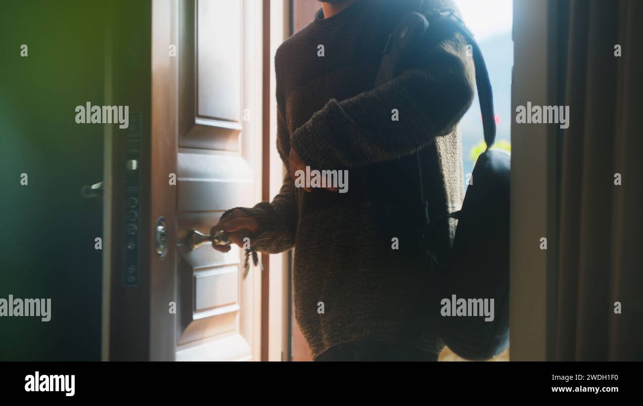 Entrance door man opens door hi-res stock photography and images - Alamy