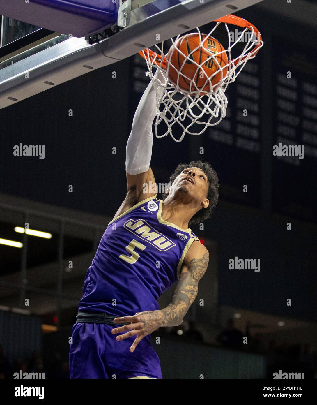 James Madison guard Terrence Edwards Jr. (5) dunks on a fast break ...