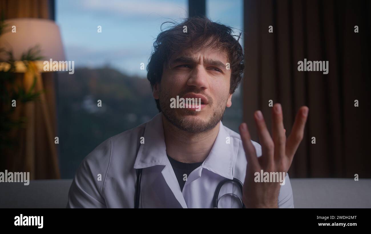 Young professional male doctor wear white uniform with stethoscope ...