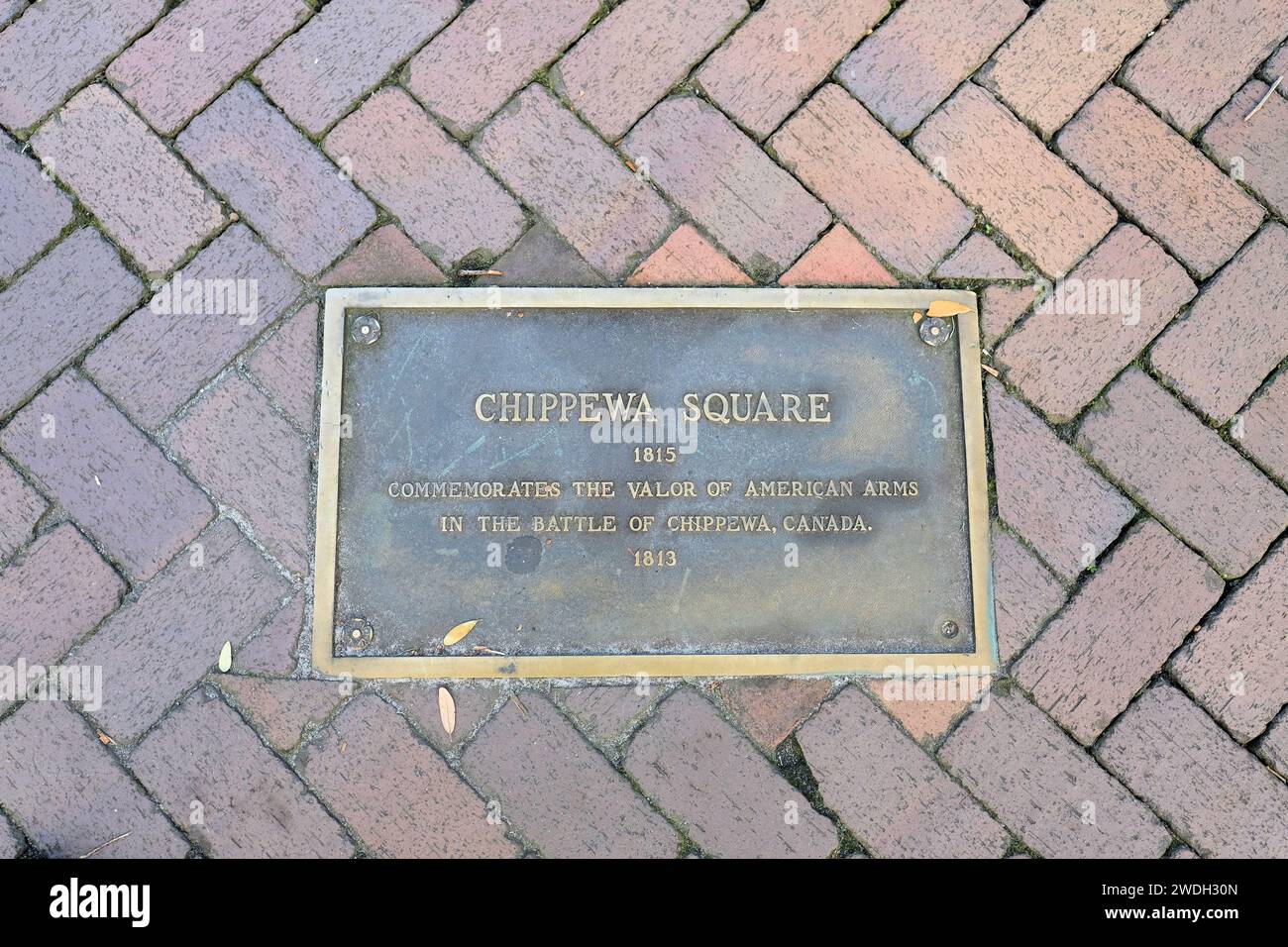 Chippewa Square name plaque on a brick walkway in Savannah, Georgia ...