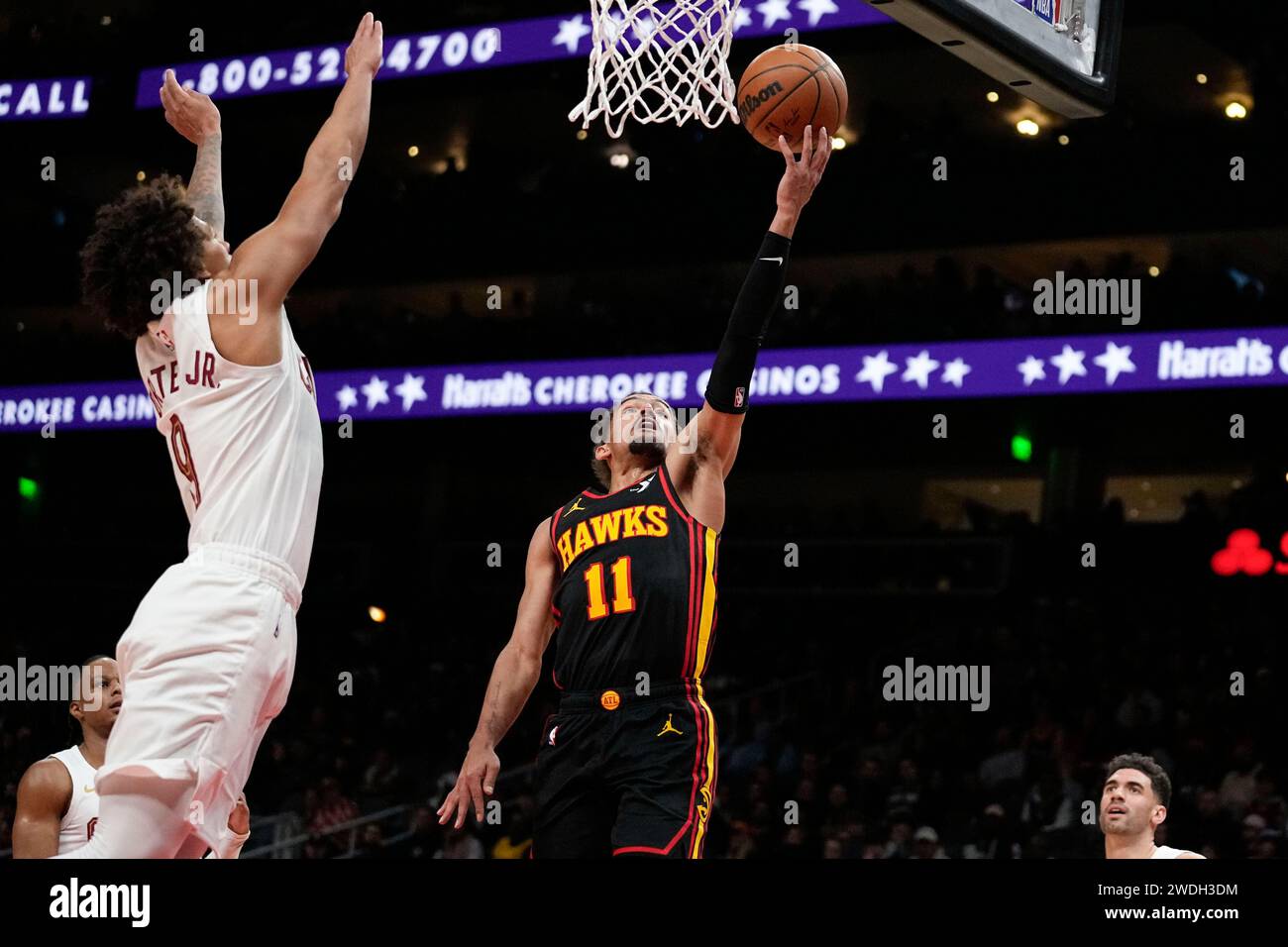 Atlanta Hawks' Trae Young (11) shoots against Cleveland Cavaliers guard ...
