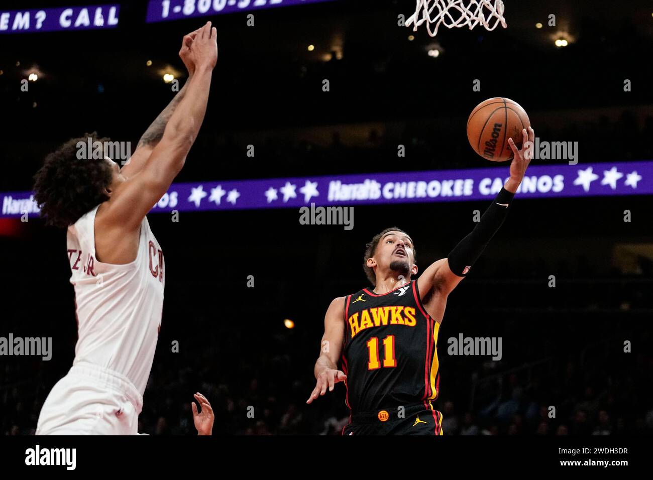 Atlanta Hawks' Trae Young (11) shoots against Cleveland Cavaliers guard ...