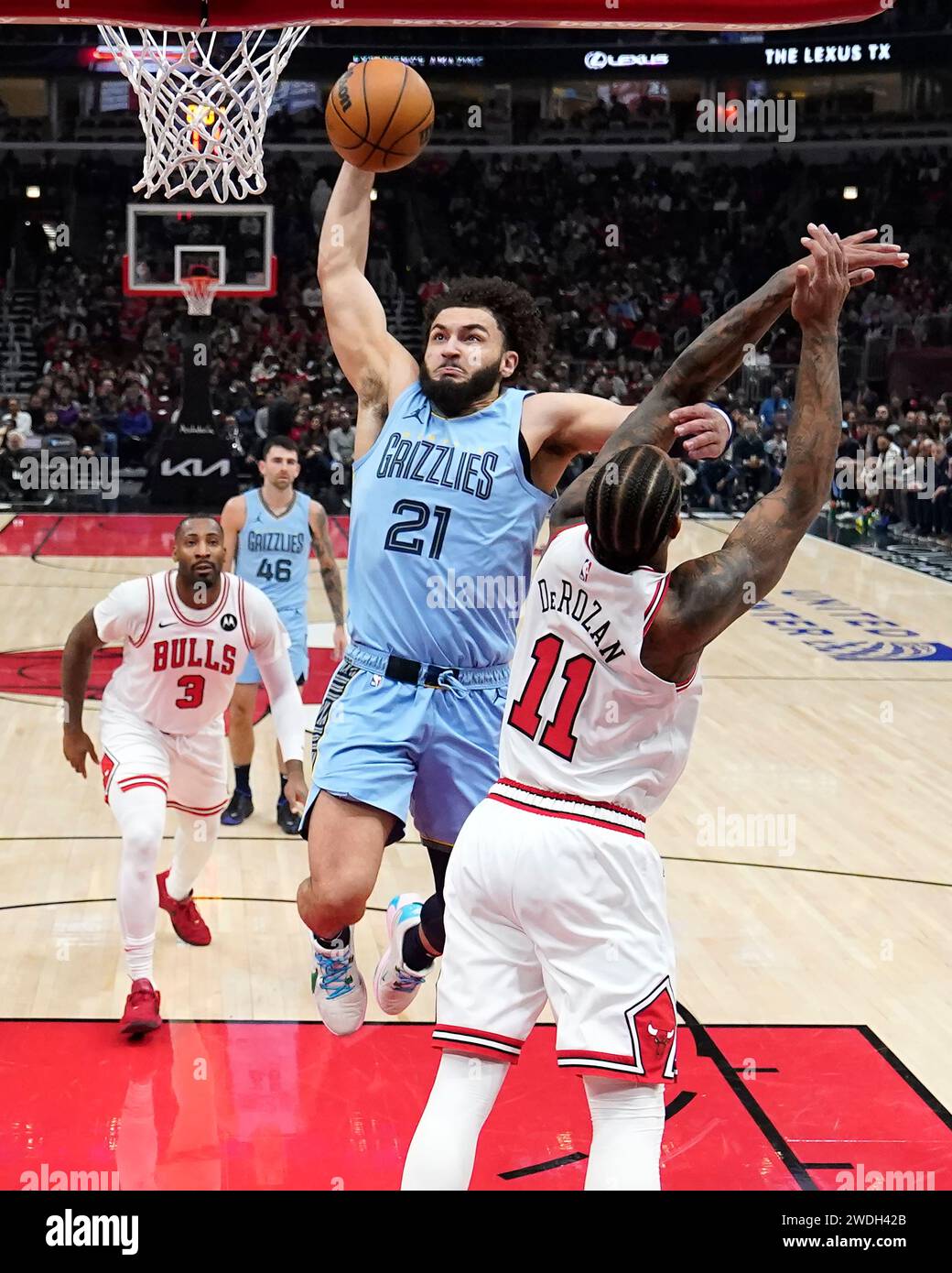 Memphis Grizzlies' David Roddy (21) dunks over Chicago Bulls' DeMar ...