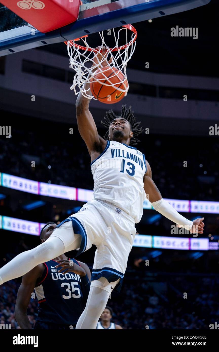 Villanova's Hakim Hart dunks as UConn's Samson Johnson watches during ...