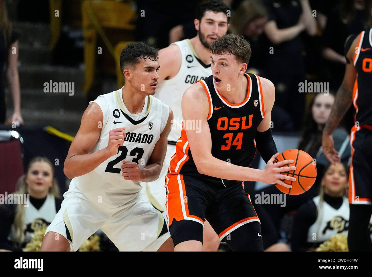 Oregon State forward Tyler Bilodeau, right, looks to pass the ball as ...