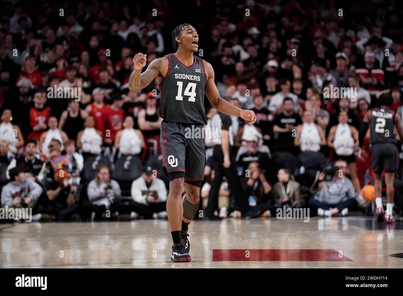 Oklahoma forward Jalon Moore yells toward his team's bench during the ...