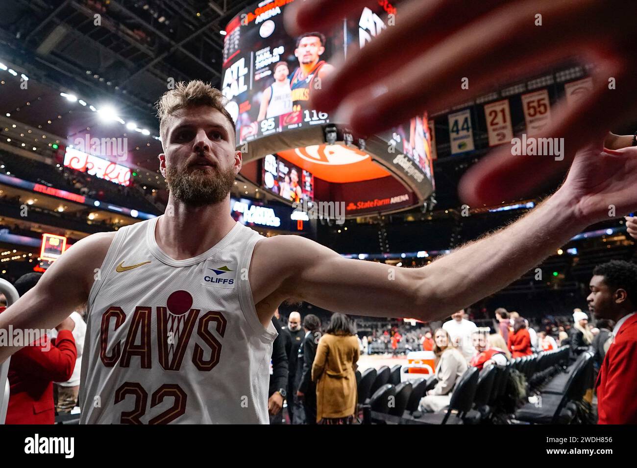 Cleveland Cavaliers forward Dean Wade (32) walks off the court giving ...