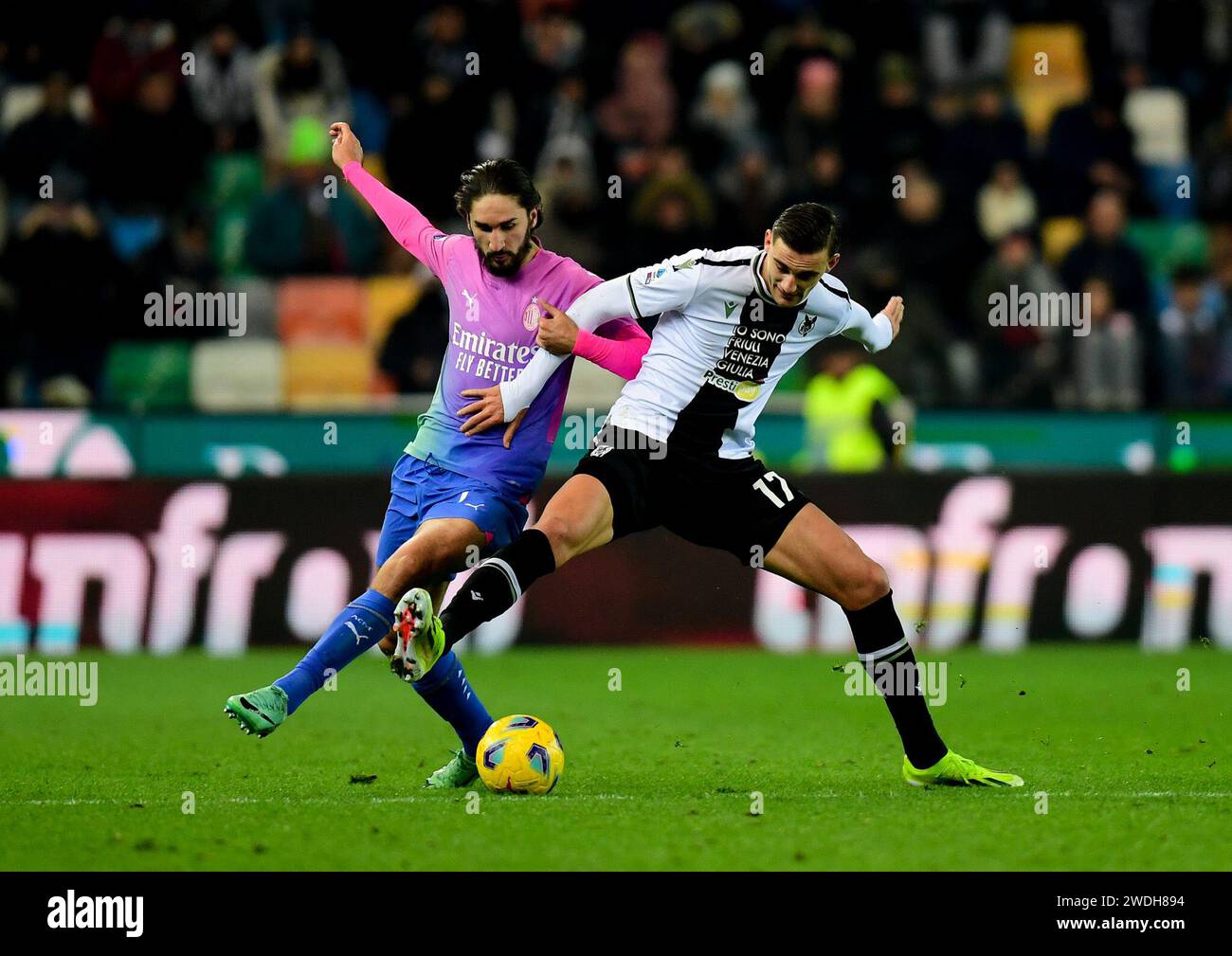 Udine, Italy. 20th Jan, 2024. AC Milan's Yacine Adli (L) vies with ...