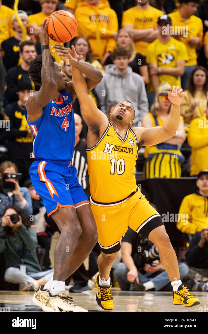 Missouri's Nick Honor, right, knocks the ball away from Florida's ...