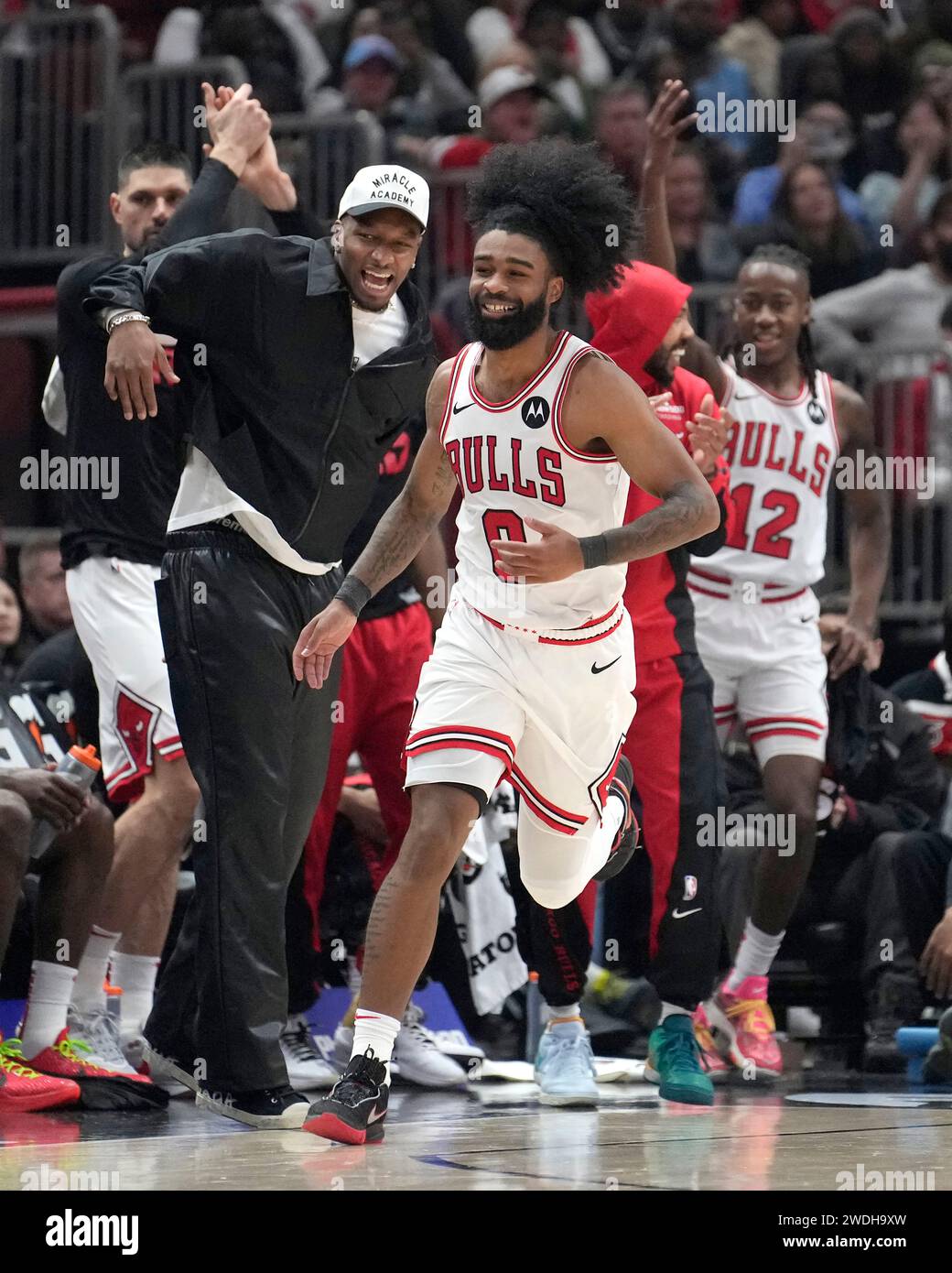 Chicago Bulls' Coby White smiles after scoring during the second half ...