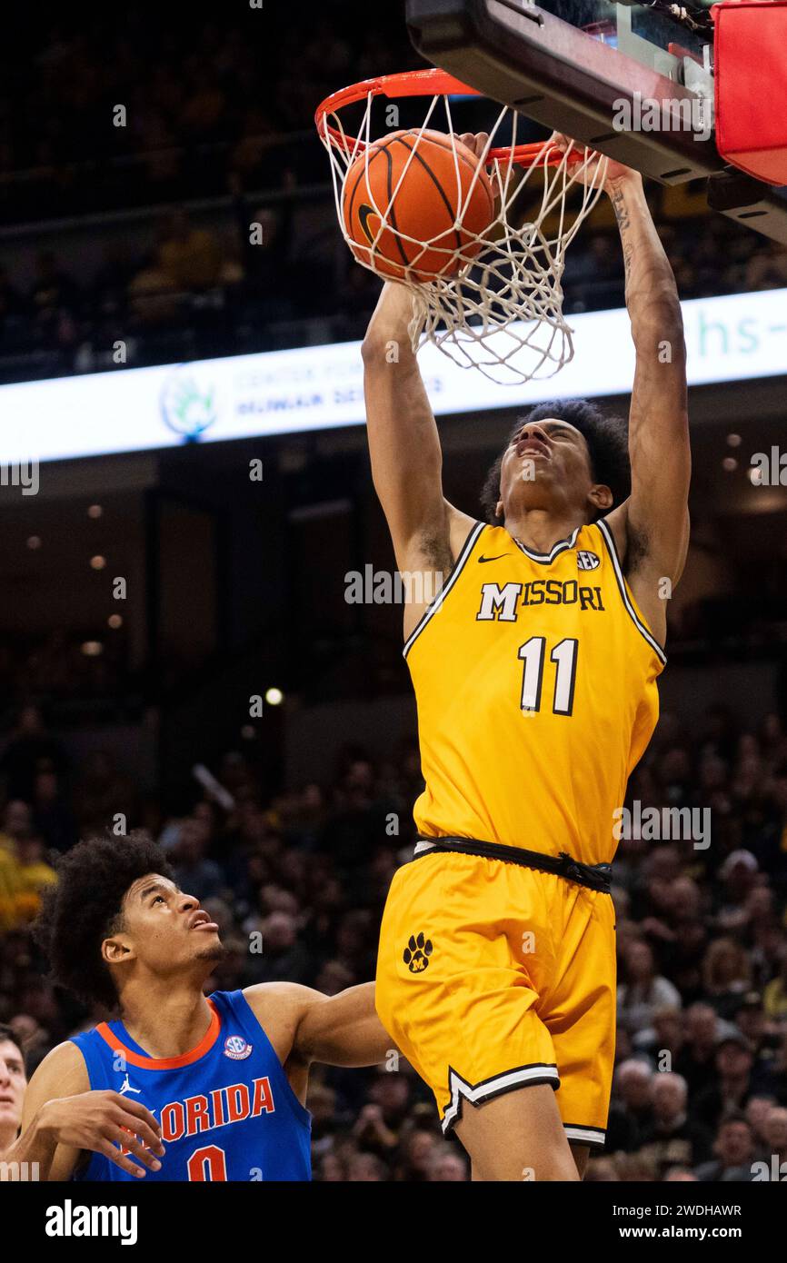Missouri's Trent Pierce dunks over Florida's Zyon Pullin during the ...