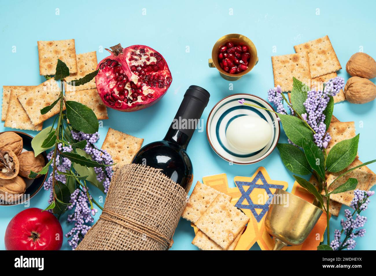 Passover celebration concept. Matzah, red kosher walnut and spring ...