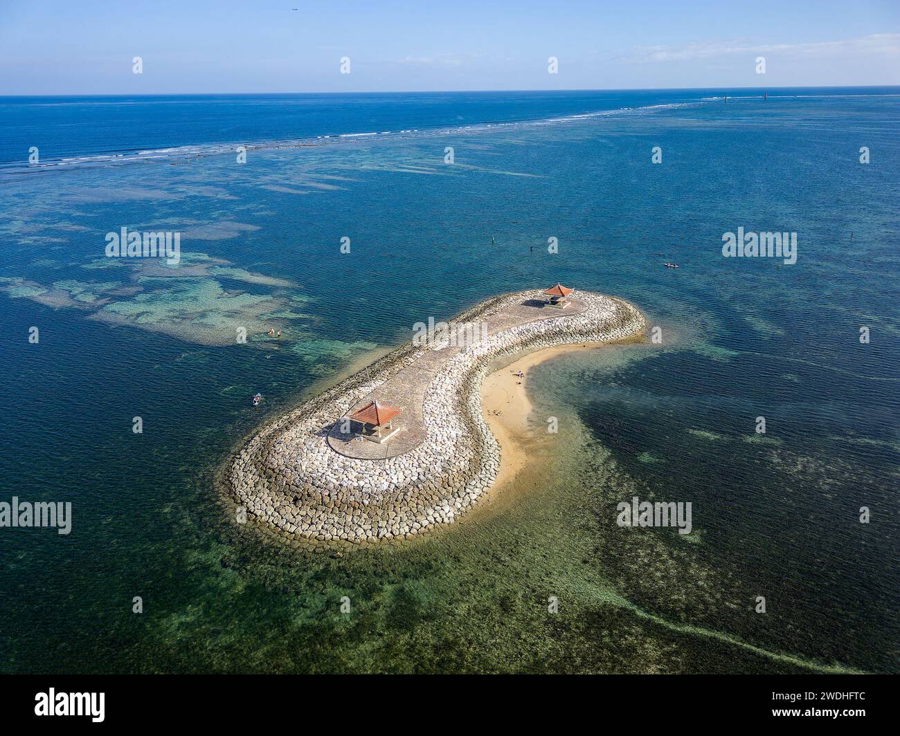 Aerial view of an offshore gazebo sheltered by a large, fringing ...