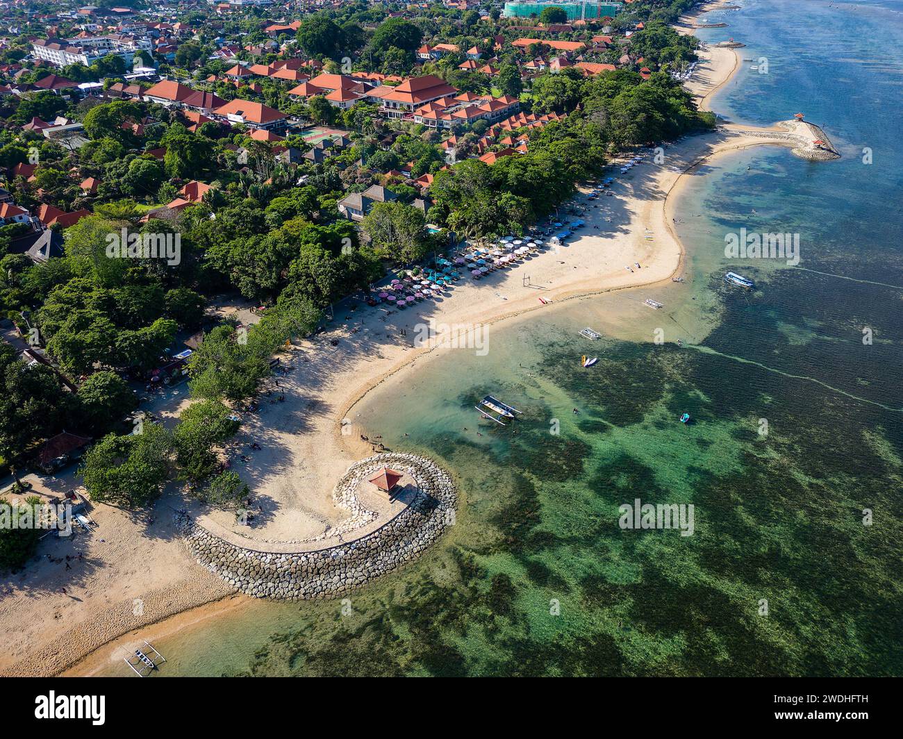 Overhead view of the sheltered tropical beach and coral reef system of ...