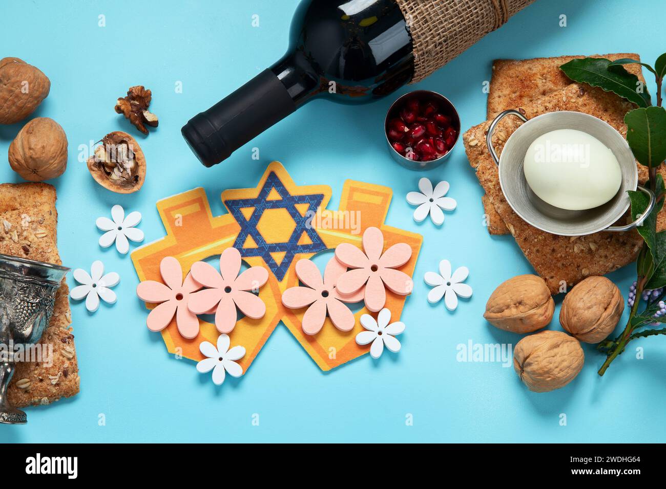 Passover celebration concept. Matzah, red kosher walnut and spring ...