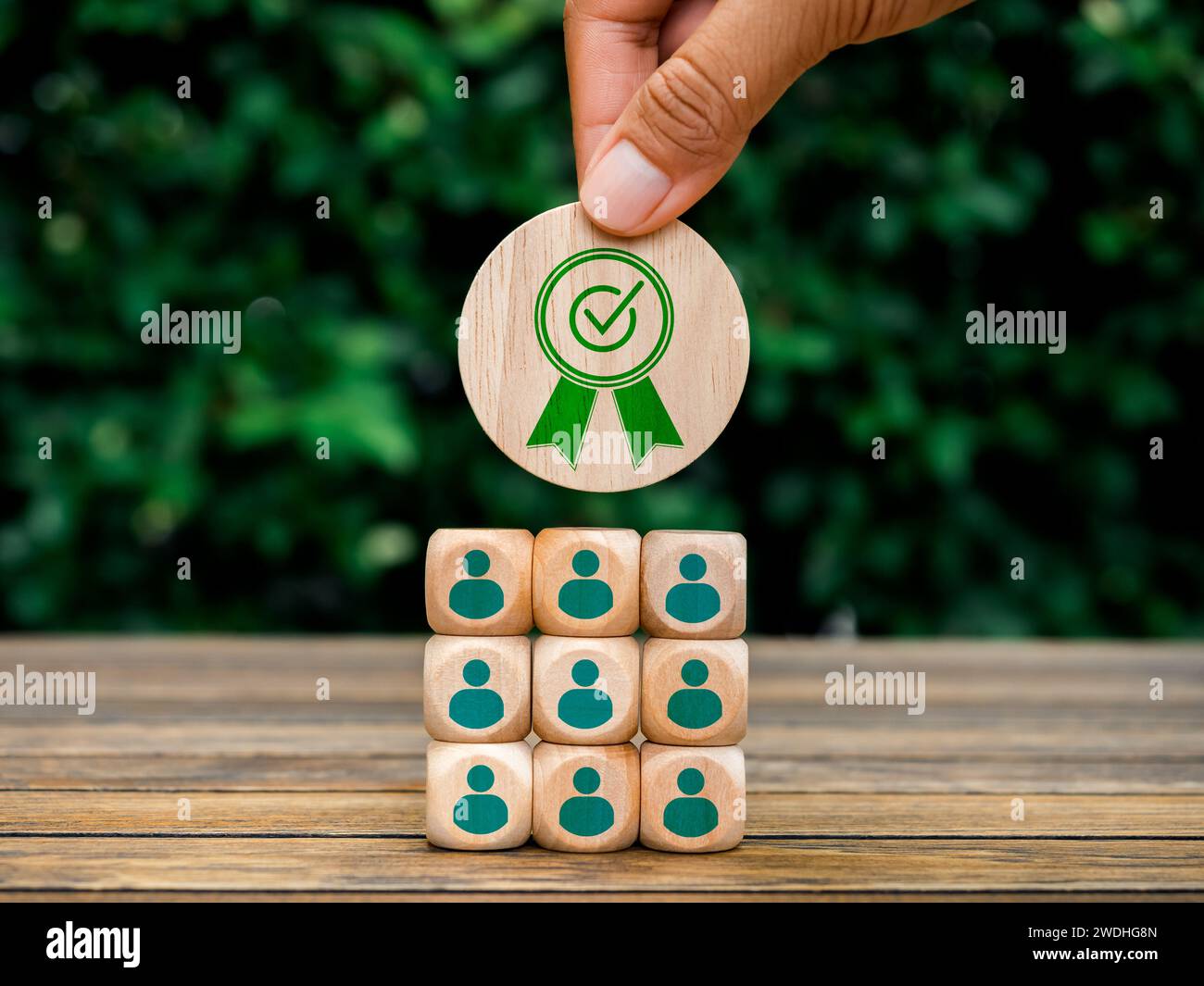 Best quality team and business service success concept. Hand put green ...