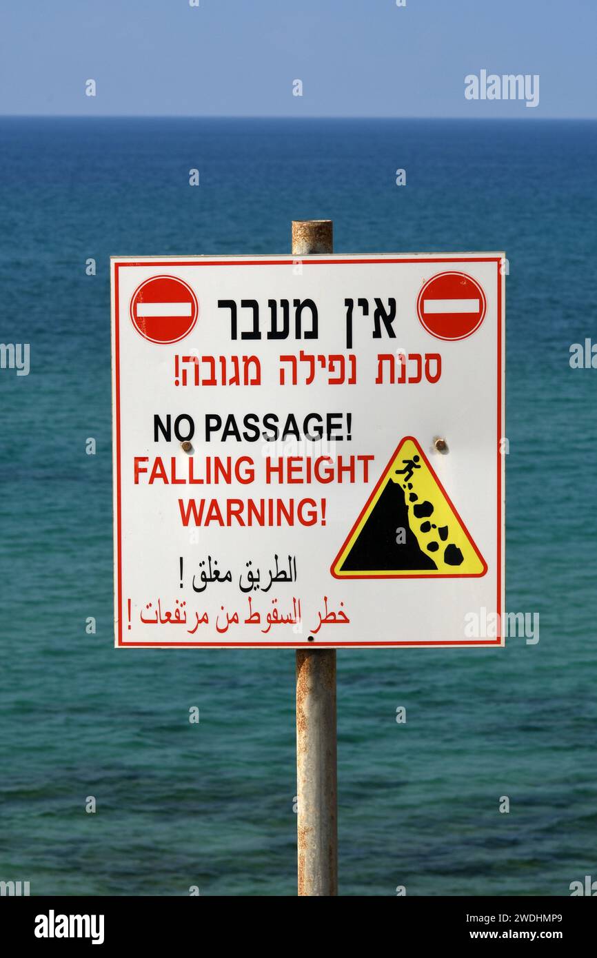 Falling height warning sign Stock Photo - Alamy