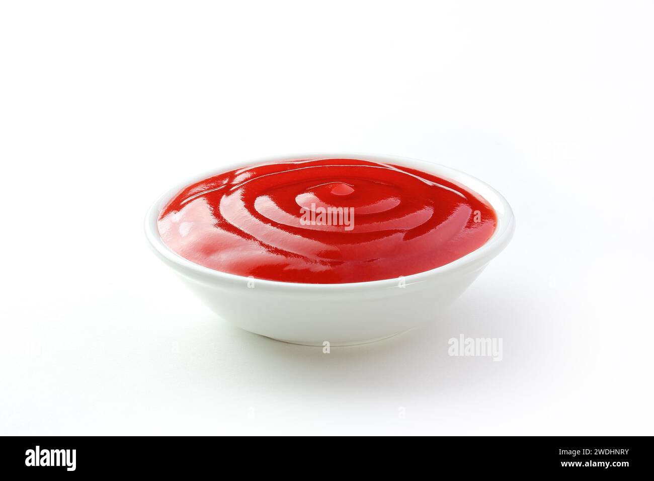 catchup in a dish isolated white background Stock Photo - Alamy