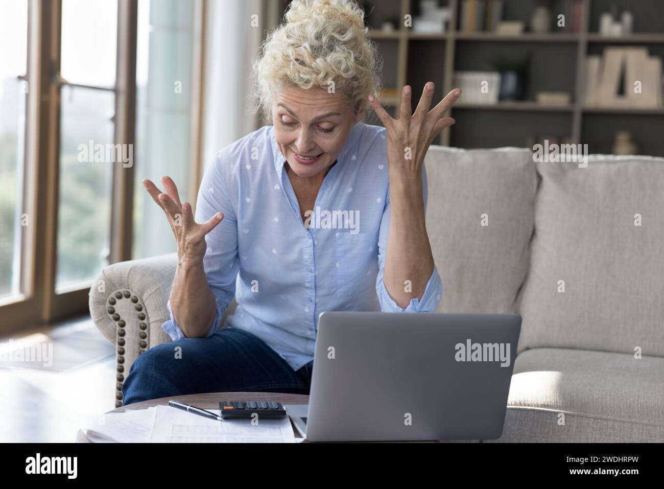 Older woman upset computer home hi-res stock photography and images - Alamy