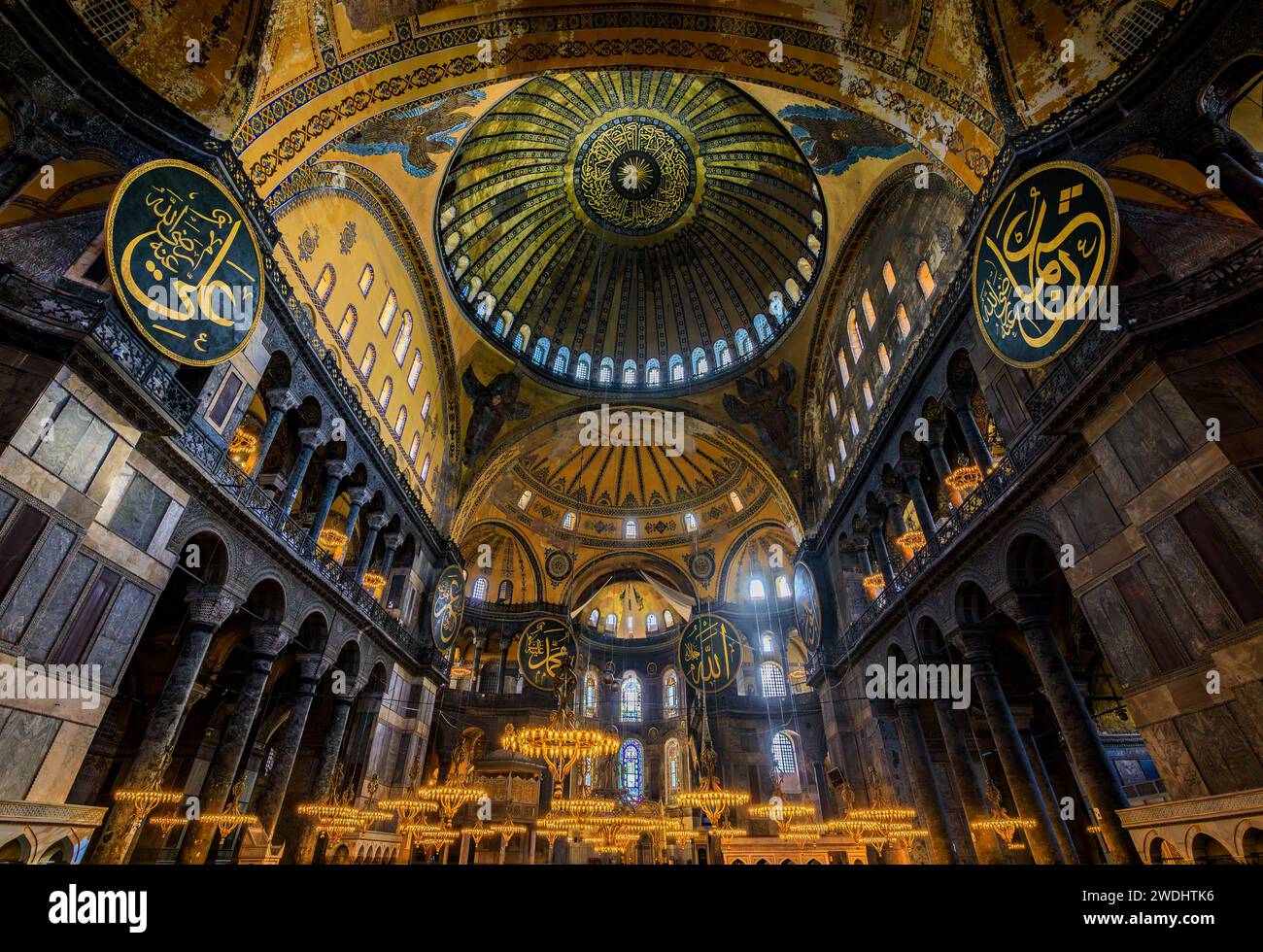 Istanbul, Turkey - November 8, 2023: Ornate interior with goldleaf mosaics and frescoes, Hagia ...
