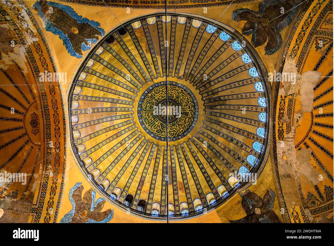 Istanbul, Turkey - November 8, 2023: Ornate dome with goldleaf mosaics and frescoes, Hagia ...