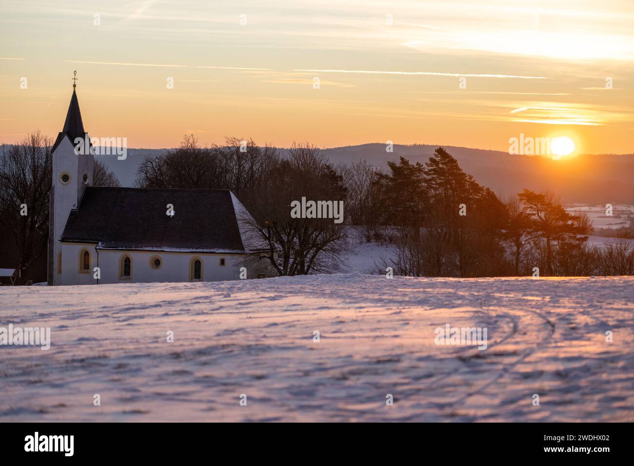 Staffelberg, Germany. 21st Jan, 2024. The sun rises over the ...