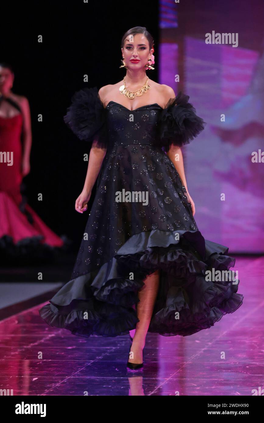 Seville, Spain. 20th Jan, 2024. A model is walking the runway at the ...