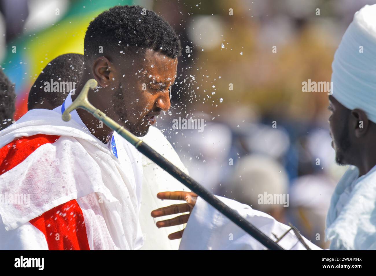Addis Ababa, Ethiopia. 20th Jan, 2024. Holy water is sprinkled onto the ...